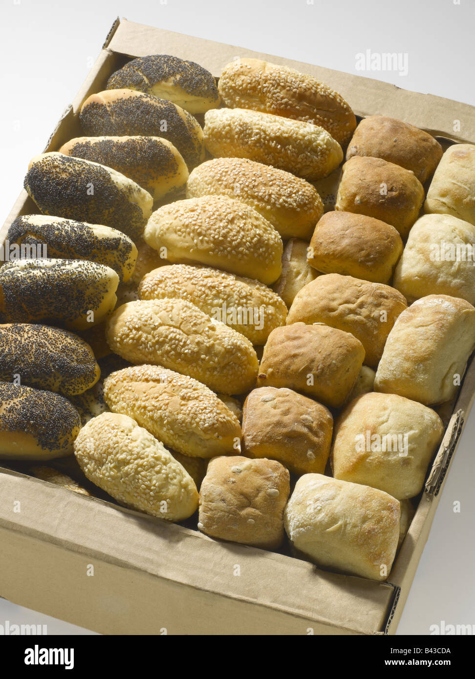 Carton of small breads Stock Photo - Alamy