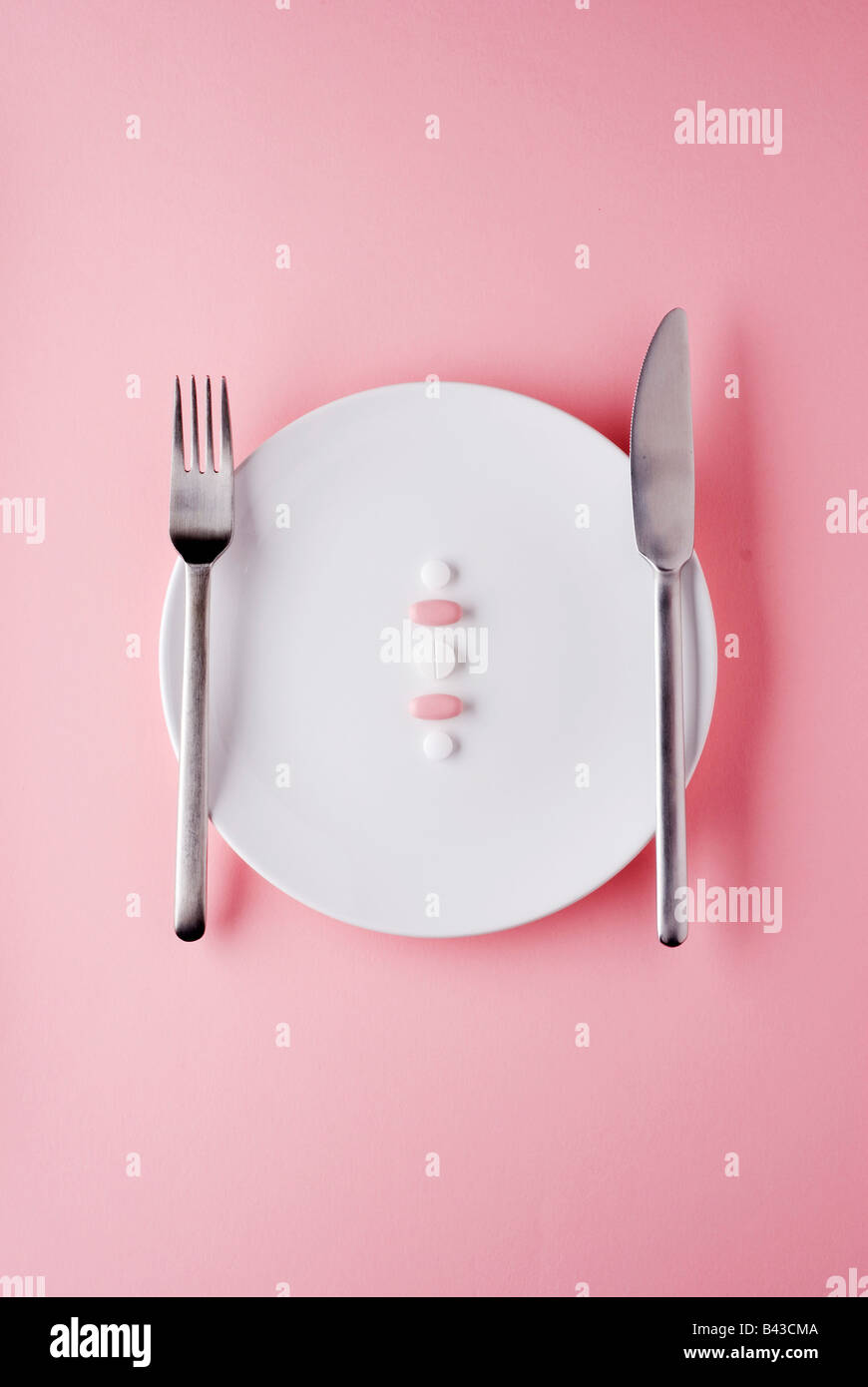 Plate of medecine pills Stock Photo - Alamy