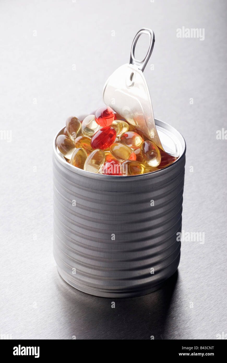 Can of medecine capsules Stock Photo - Alamy