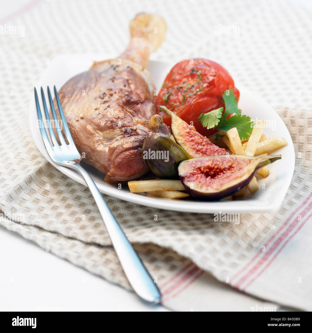 leg of duck with fresh figs Stock Photo - Alamy