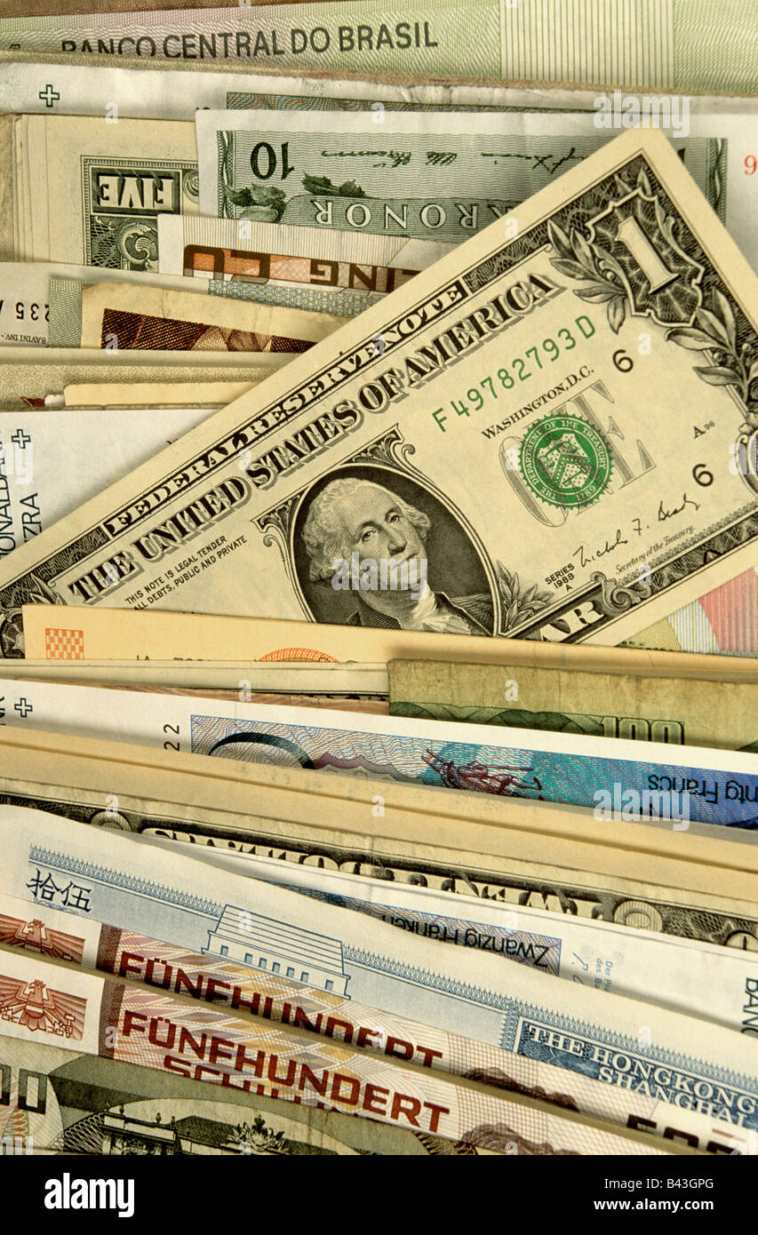 Various banknotes from different countries arranged closely together on ...