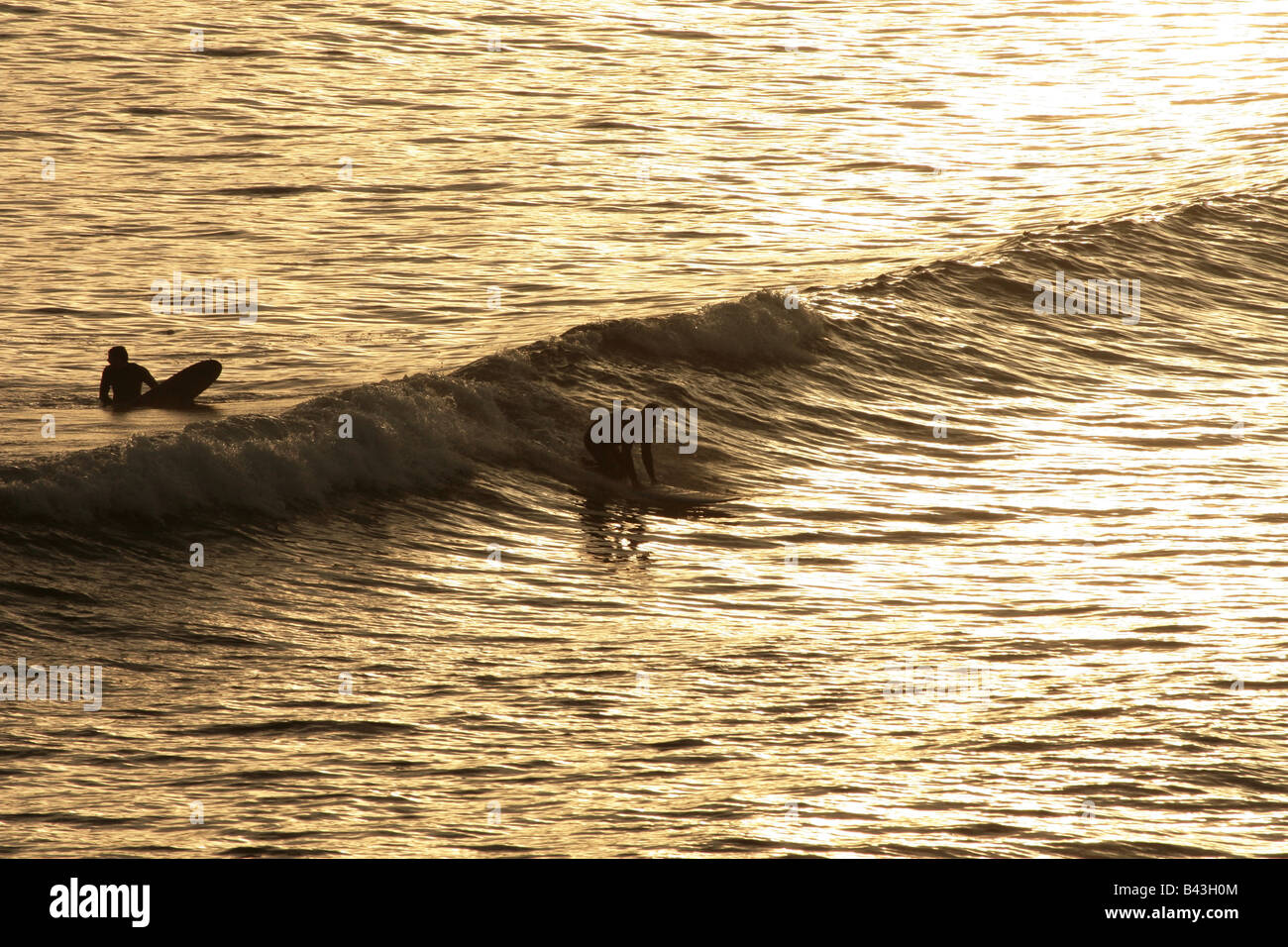 Surfers at Manorbier beach Wales Stock Photo - Alamy