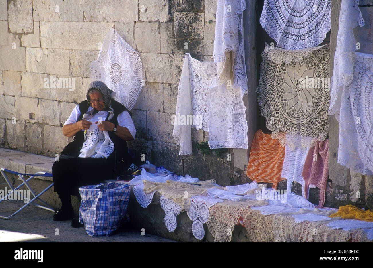 Old woman knitting in old town of Zadar, Croatia Stock Photo - Alamy