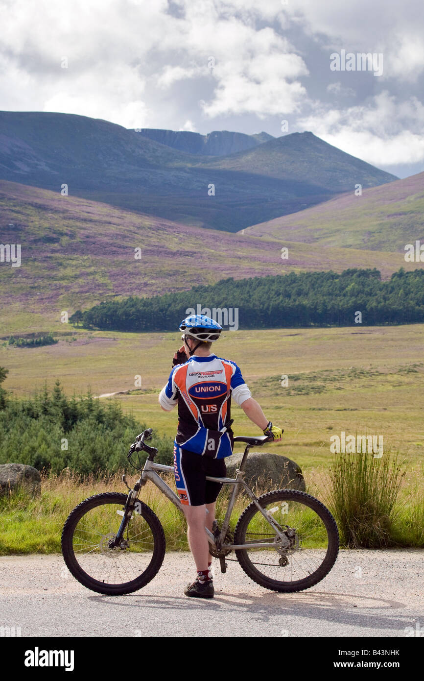 Cyclist wearing Cycle Racer wearing aerodynamic helmet Countryside ...