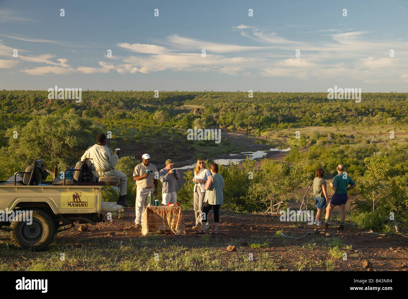 Guests on early morning game drive having a coffee break Mashatu Game ...