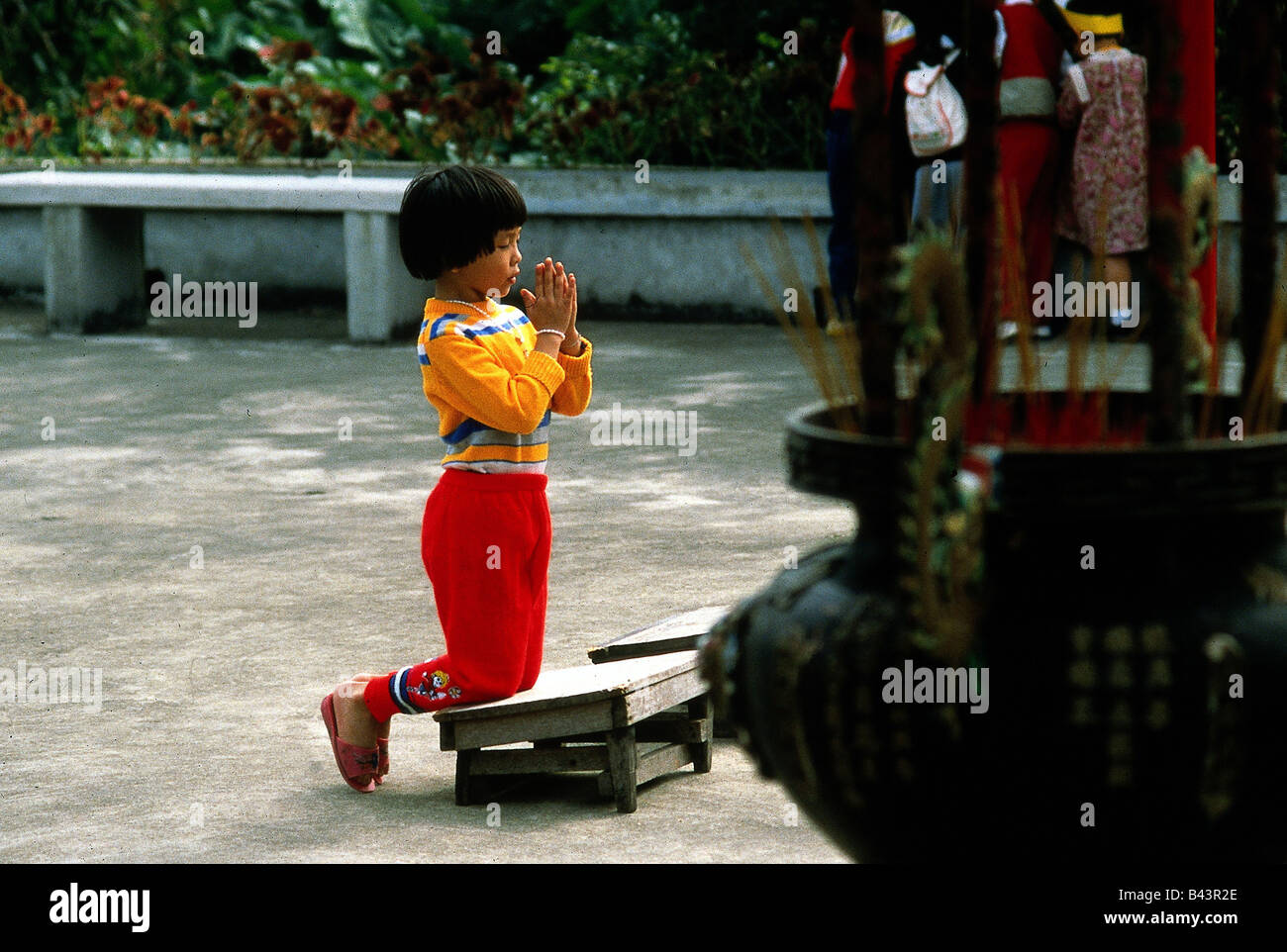 geography / travel, Hongkong, people, praying girl in a temple ...