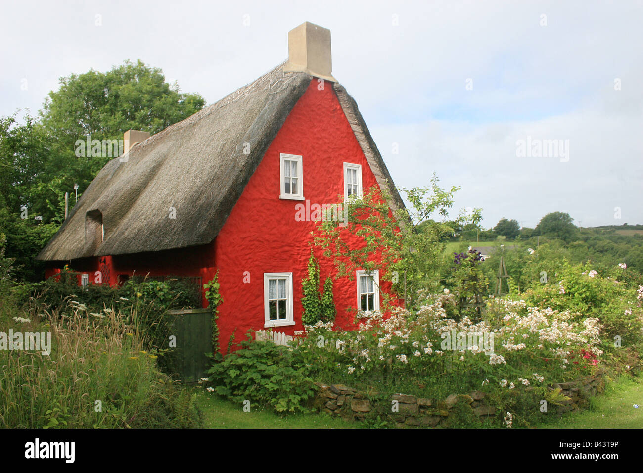 Ireland - red, thatched house Stock Photo - Alamy