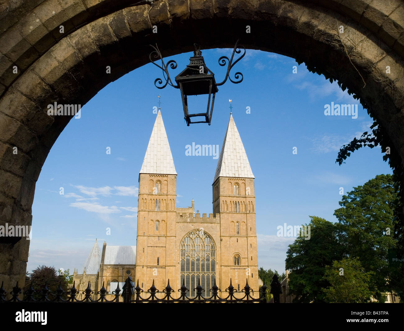 Southwell Minster viewed through an archway at the entrance gate, in ...