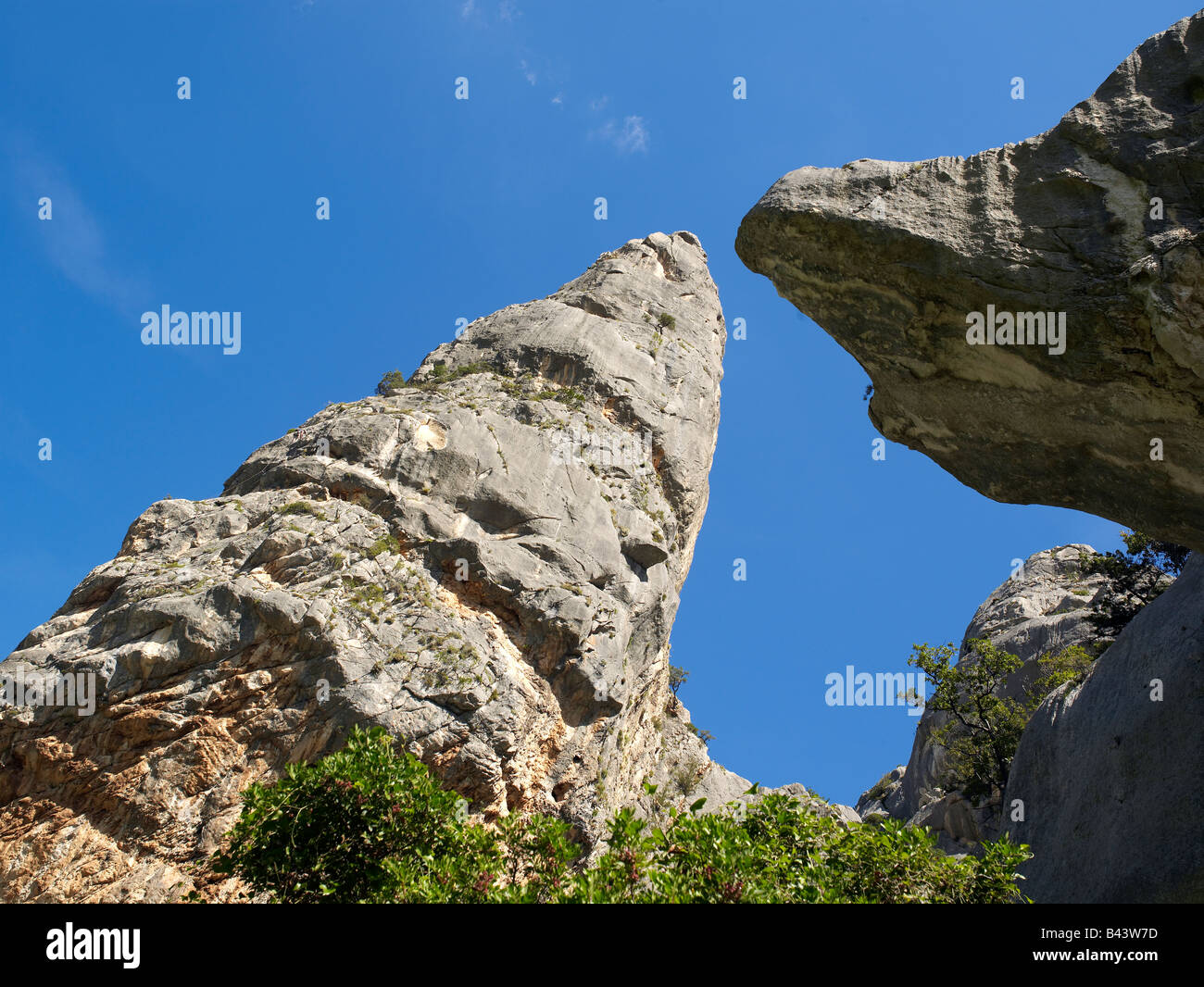 A mighty limestone rock at the east coast of Sardinia at the Golfo di ...