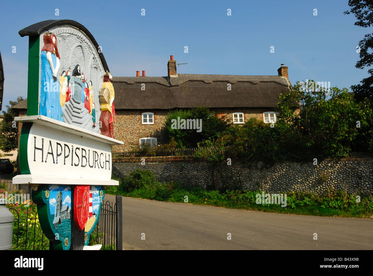 Happisburgh village sign Stock Photo - Alamy