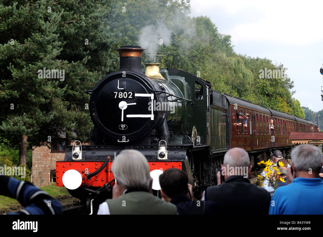 Steam engine pulling into a station on the Severn Valley Railway ...