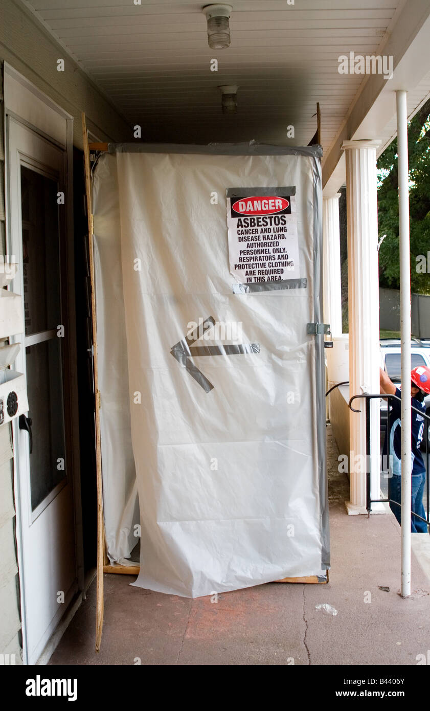 Entrance door to asbestos abatement work area Stock Photo - Alamy