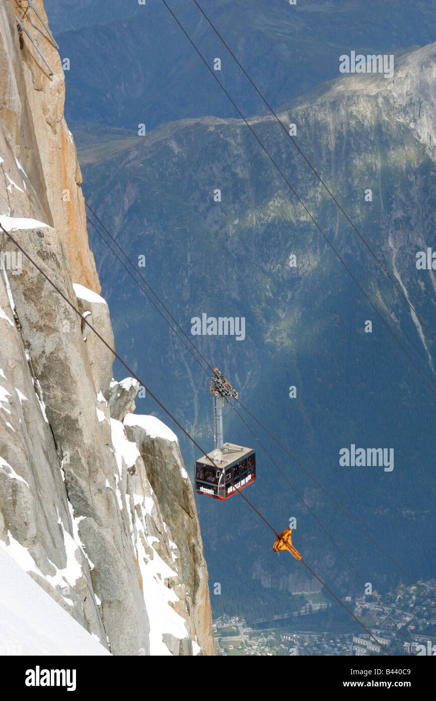 The cable car approaches the summit of the Aiguille du Midi, Chamonix ...