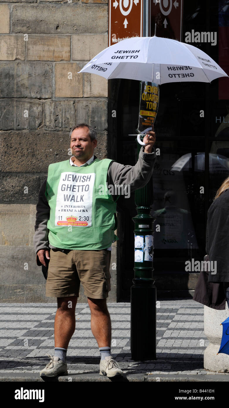 Portrait of a street guide advertising their services in the centre of ...