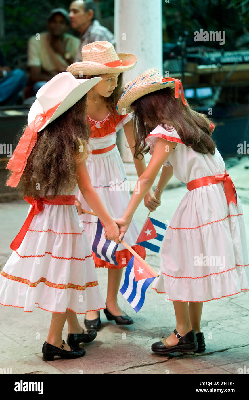 Three young Cuban schoolgirls (girls ) dance. Matanzas, Cuba Stock ...