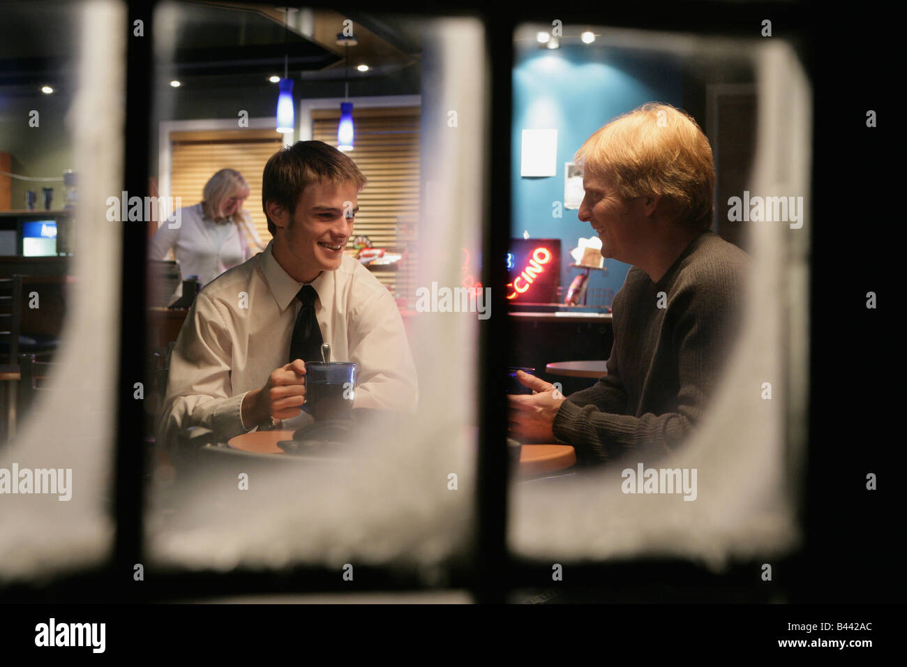 Men having a conversation Stock Photo - Alamy