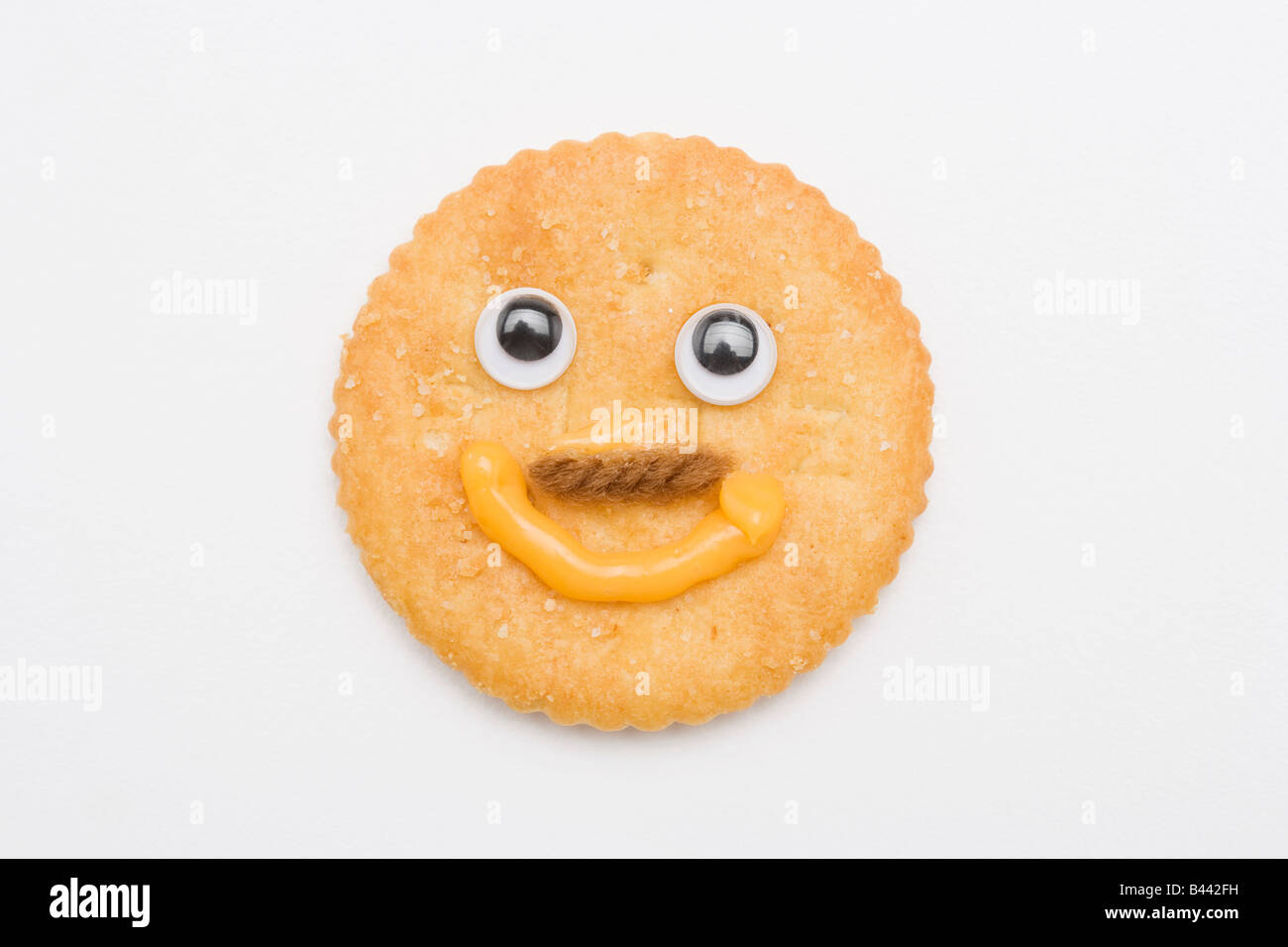 Happy face cracker Stock Photo - Alamy