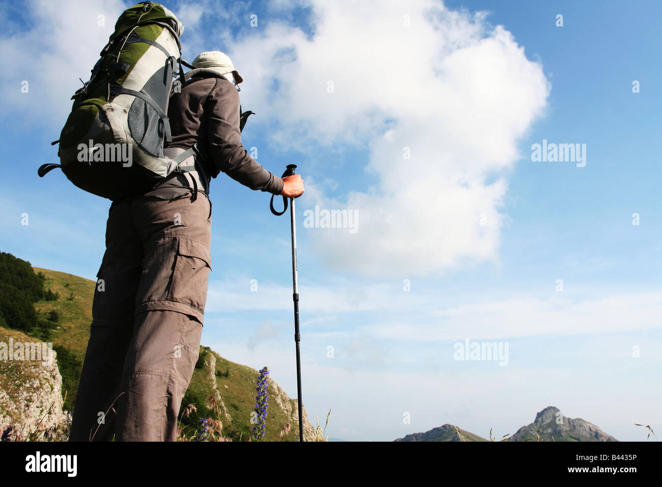 Male stand on the rock Stock Photo - Alamy