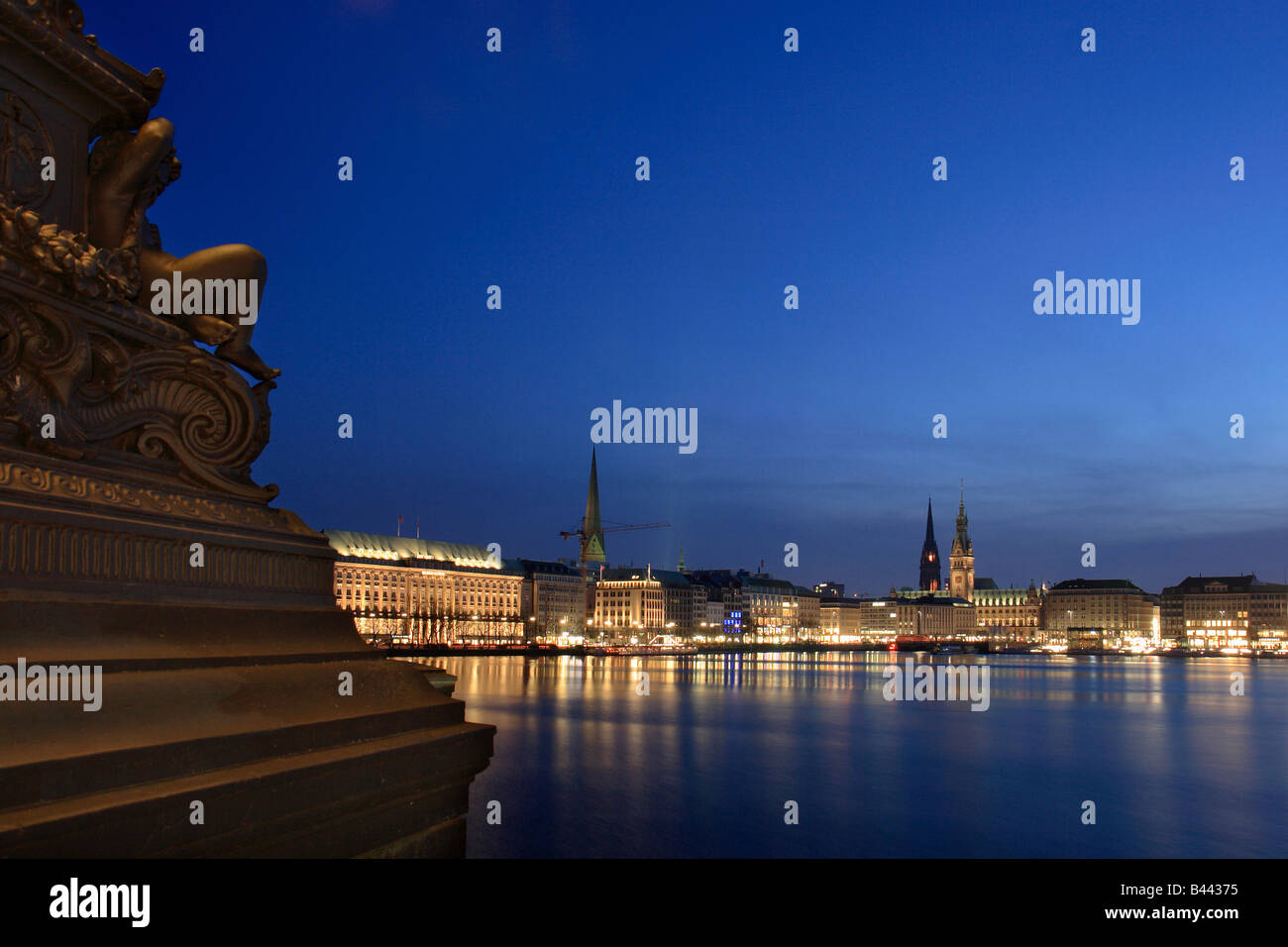 The Inner Alster Lake and the Jungfernstieg Street in the evening ...