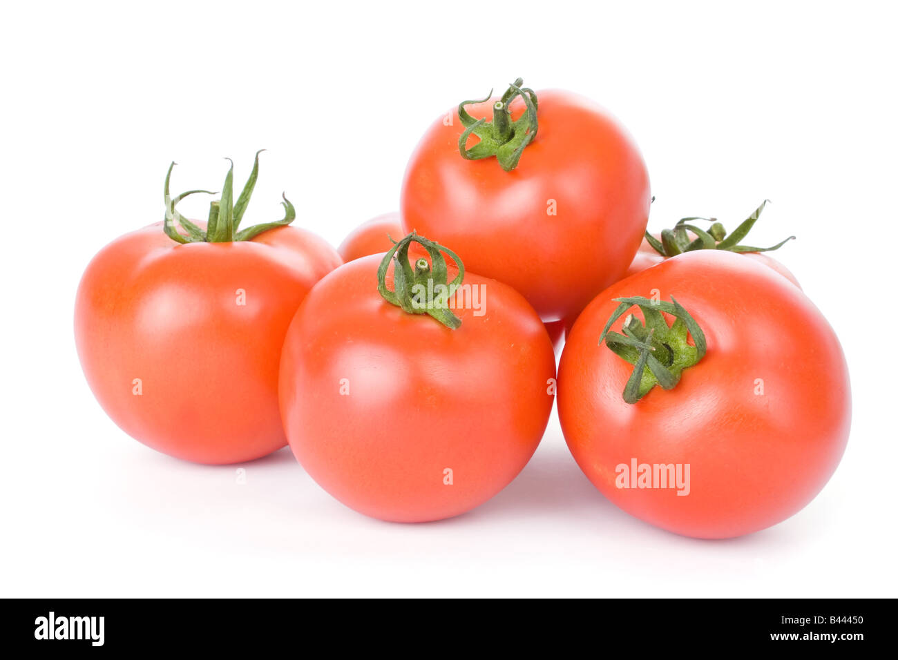 Ripe tomatoes isolated on a white background Stock Photo - Alamy