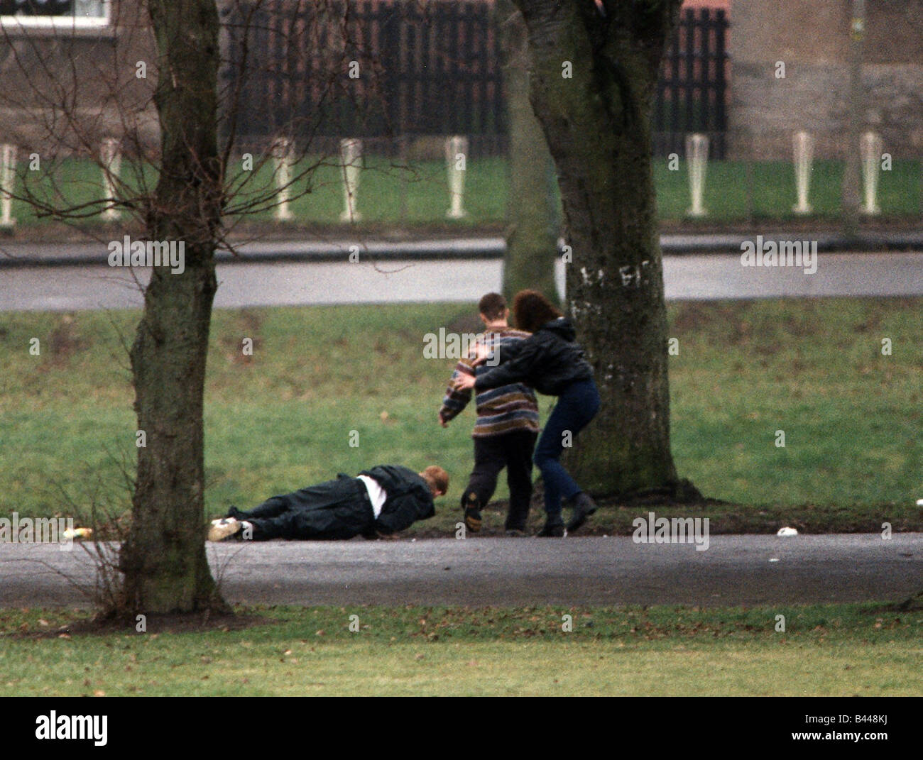 Teenage drinkers falling about in Airdrie Central park drunk Stock ...