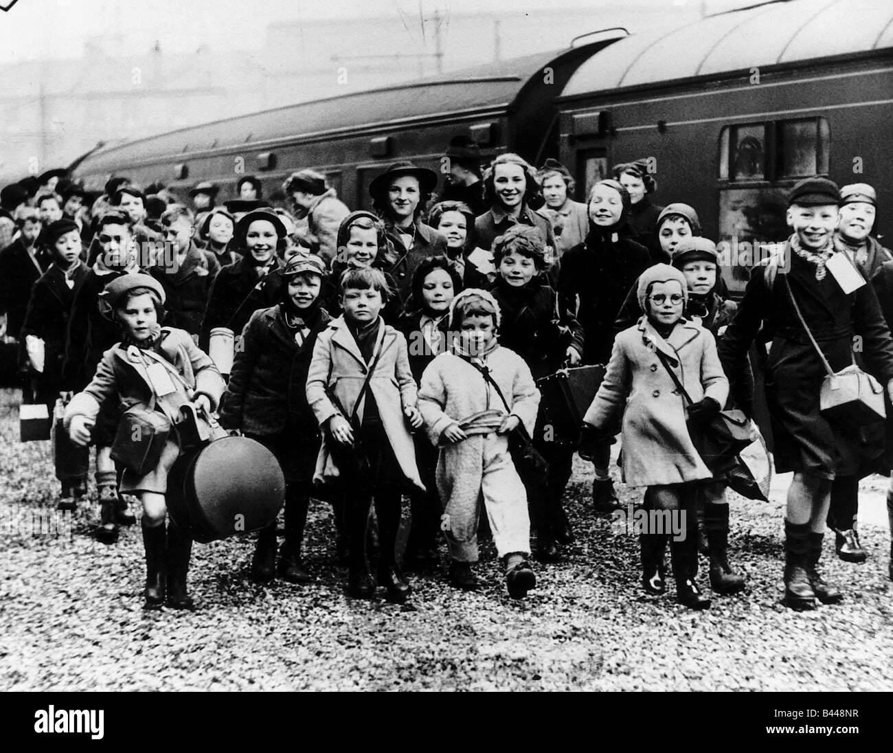 World War Two Children evacuated from the cities disembark from a train ...