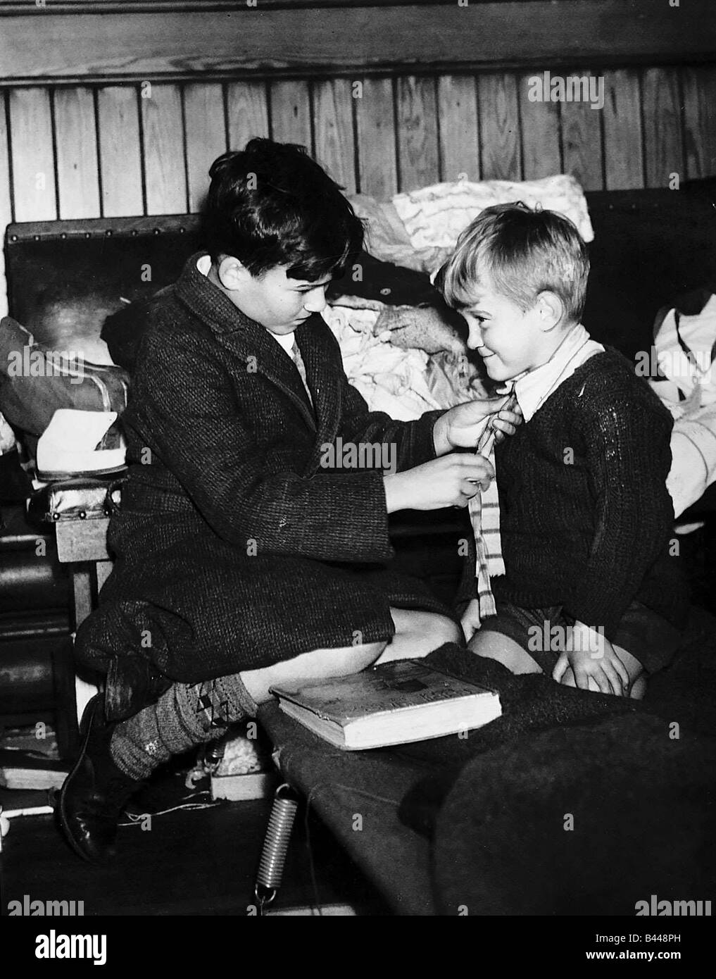 World War Two 1940 Evacuee boy gets a helping hand from his elder ...