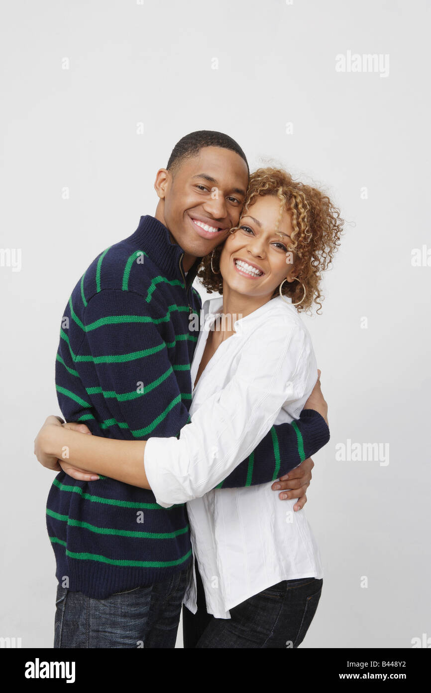 African couple hugging Stock Photo - Alamy