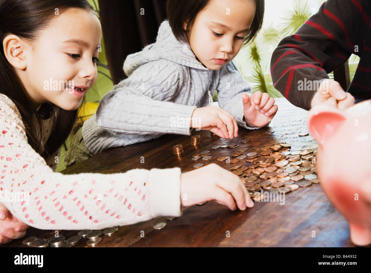 Boys counting money hi-res stock photography and images - Alamy