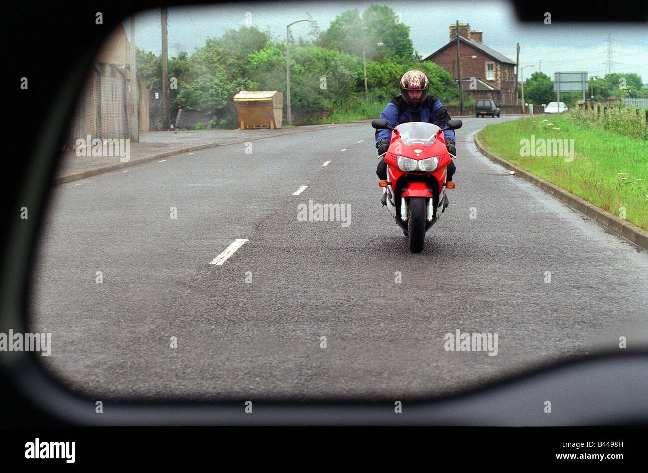 Green Vauxhall Astra van July 1999 with red Honda motorbike Stock Photo ...