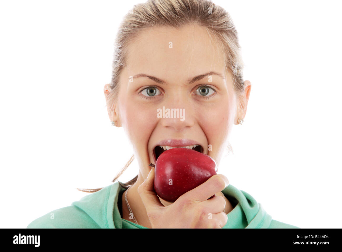 Young Woman Eating Red Apple Model Released Stock Photo - Alamy