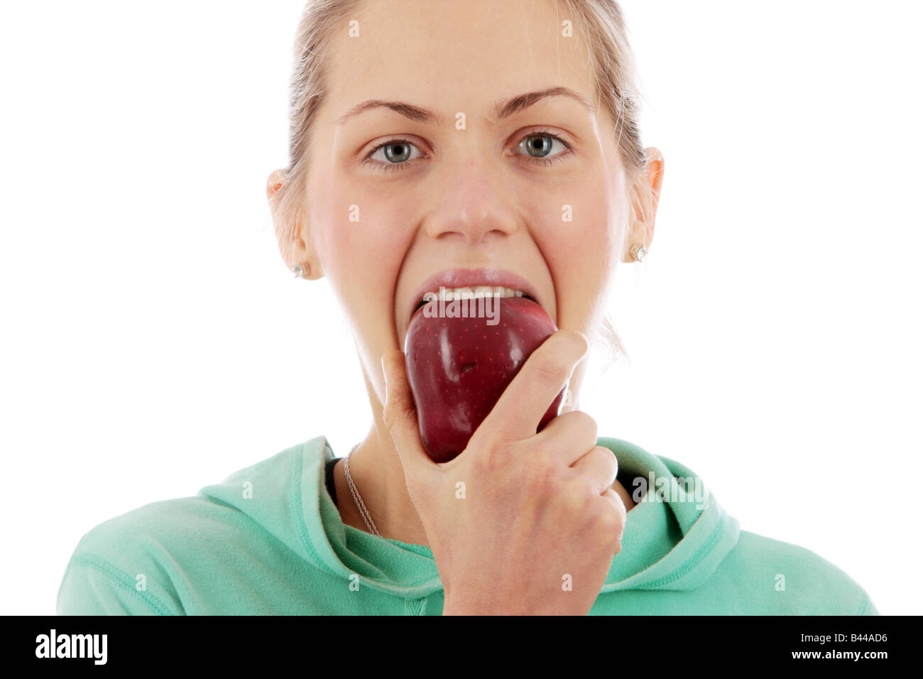 Young Woman Eating Red Apple Model Released Stock Photo - Alamy