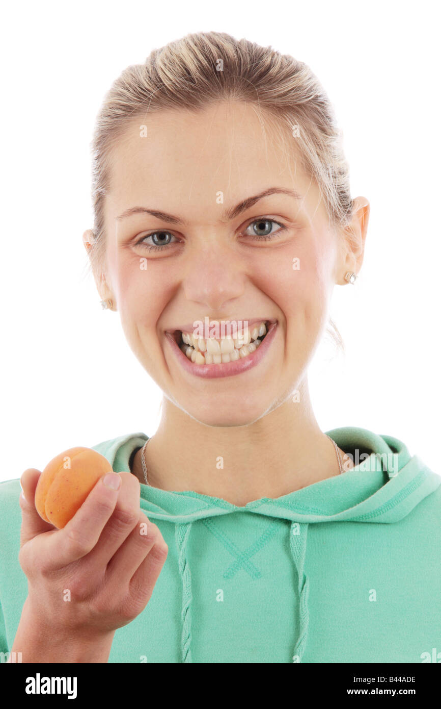 Young Woman Holding Apricot Model Released Stock Photo - Alamy