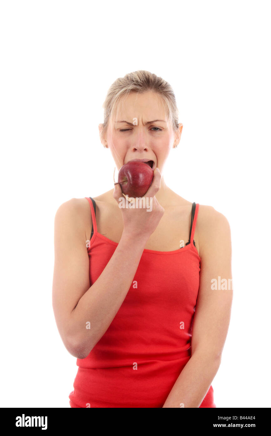Young Woman Eating Red Apple Model Released Stock Photo - Alamy