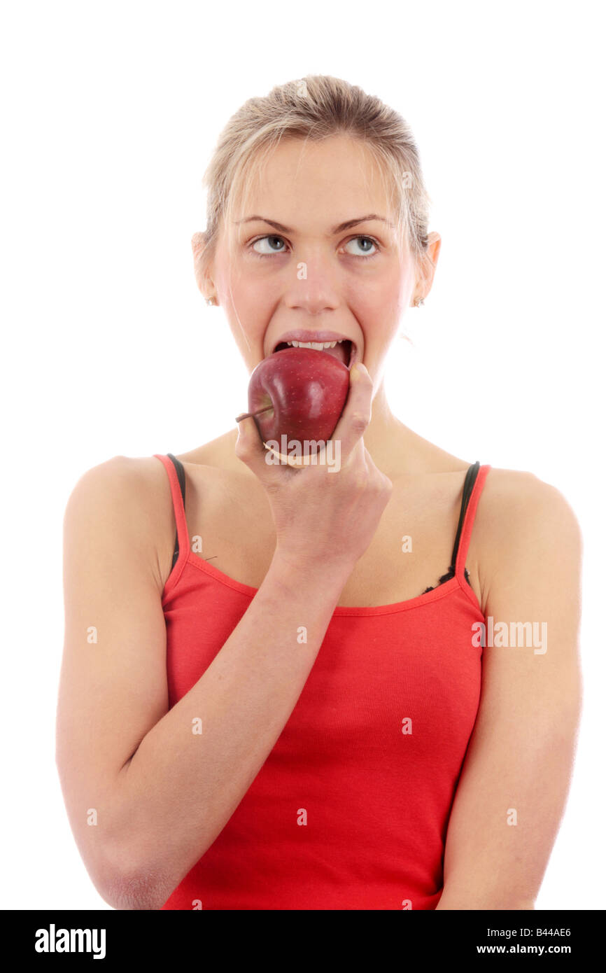 Young Woman Eating Red Apple Model Released Stock Photo - Alamy