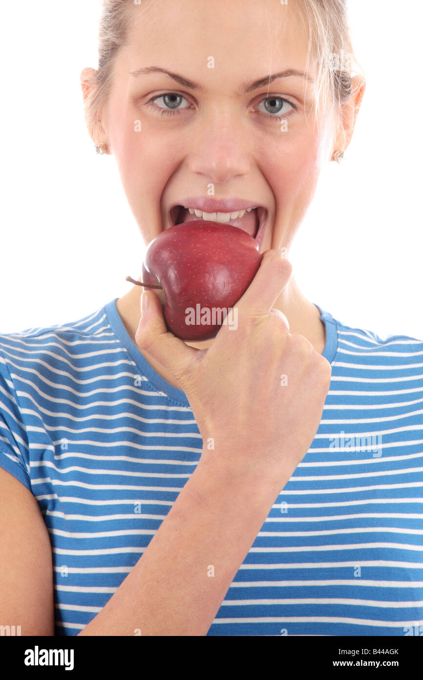 Young Woman Eating Red Apple Model Released Stock Photo - Alamy