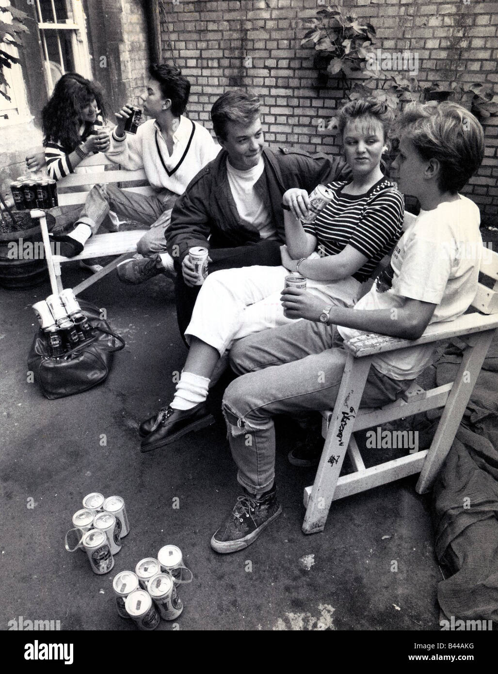 Young models drinking Stock Photo - Alamy