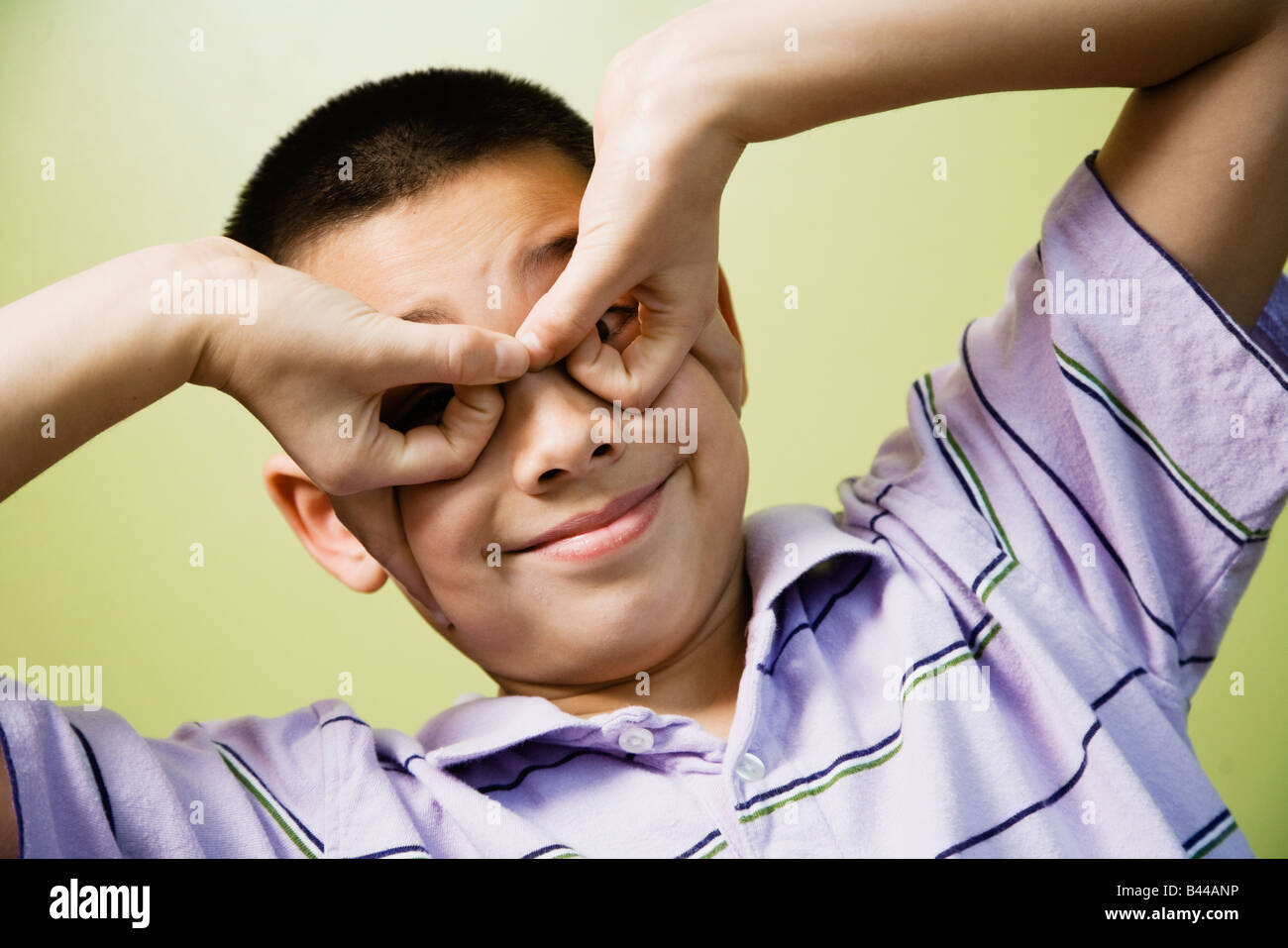 Asian boy being silly Stock Photo - Alamy