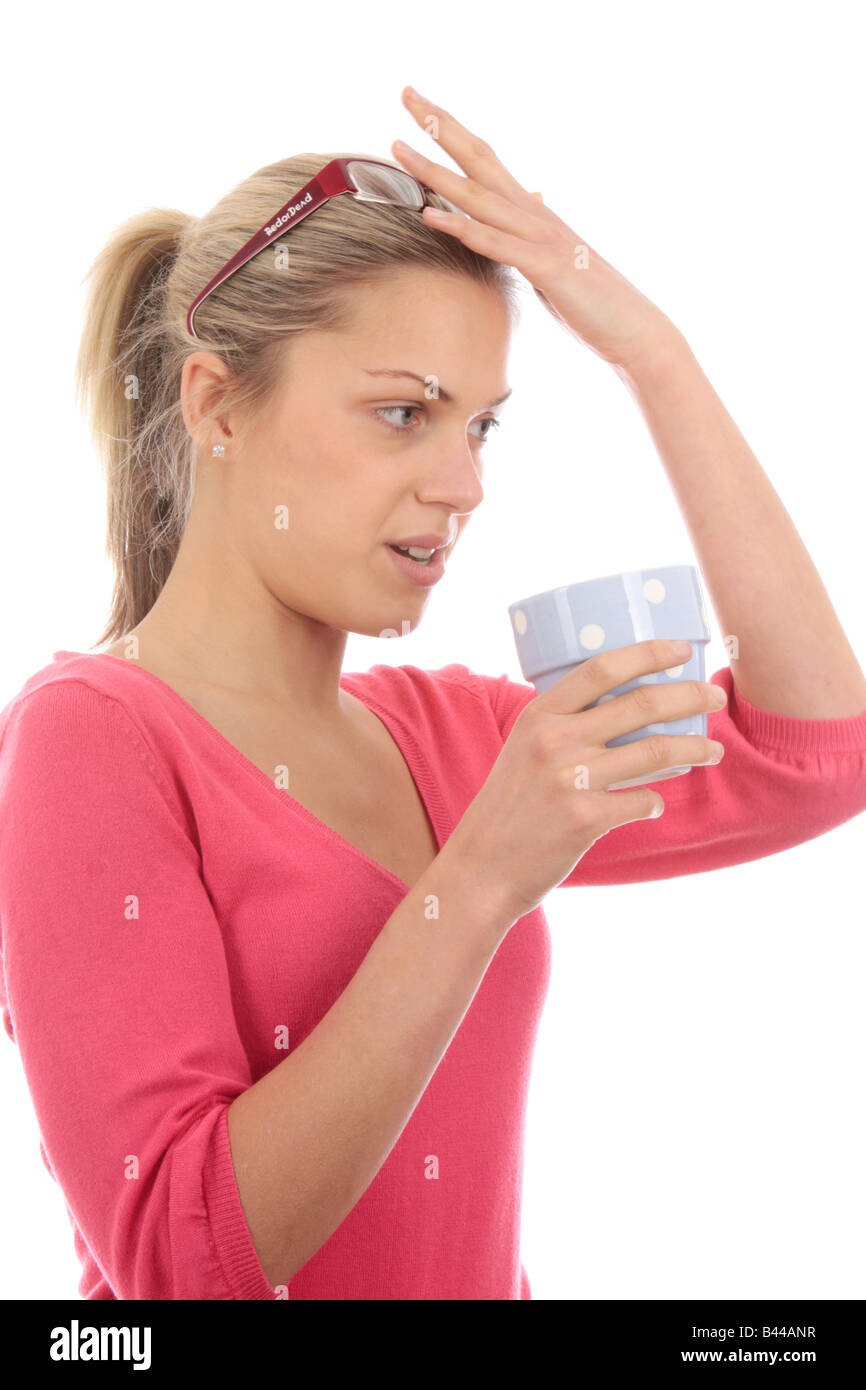 Young Woman Holding Cup of Model Released Stock Photo - Alamy