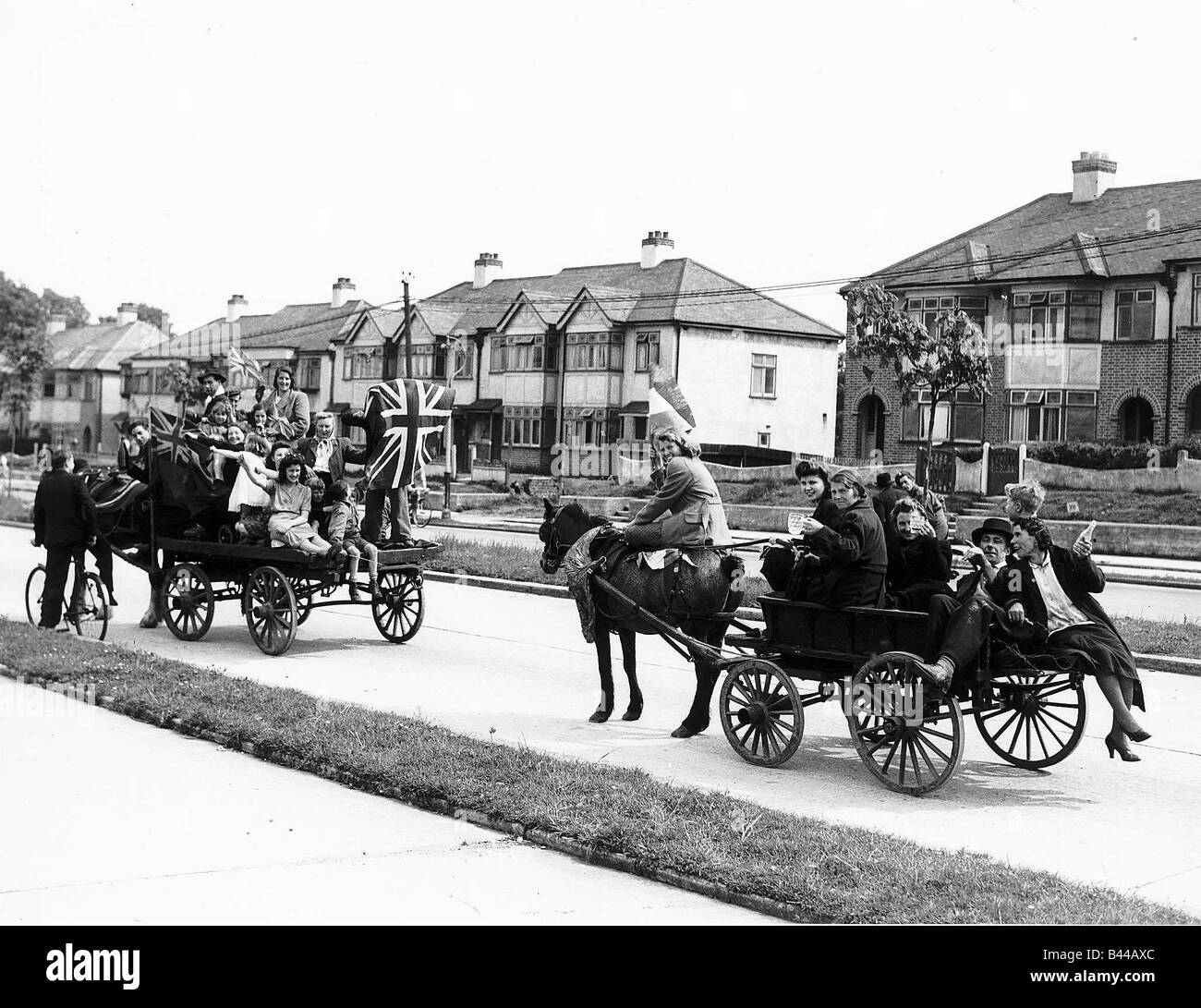 Horses and carts being driven through Southend as part of the WW2 VE ...