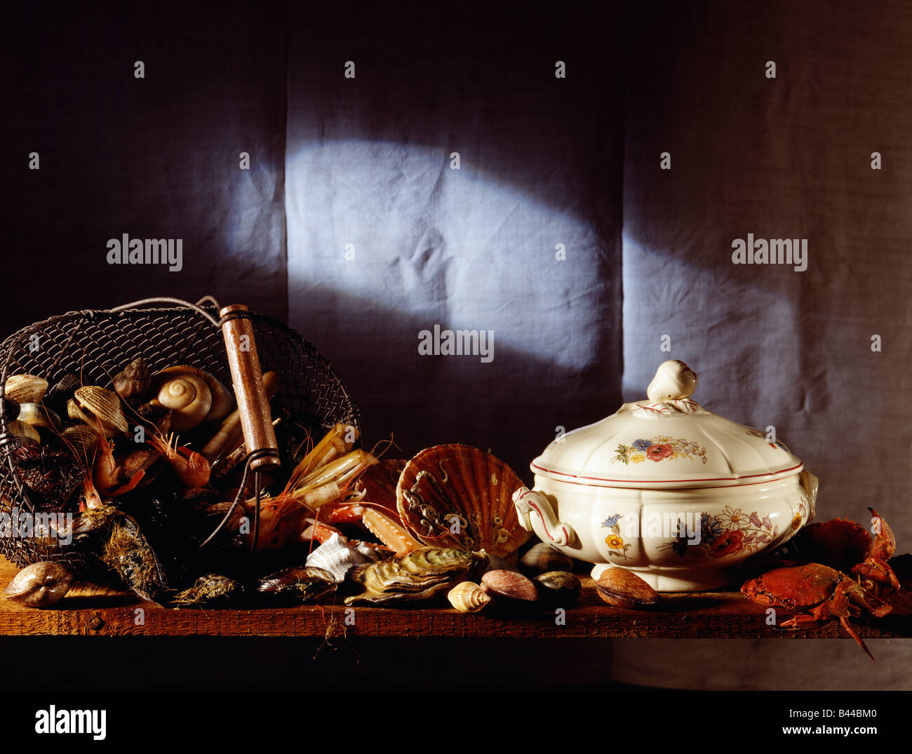 Selection of food and shellfish and soup tureen Stock Photo - Alamy