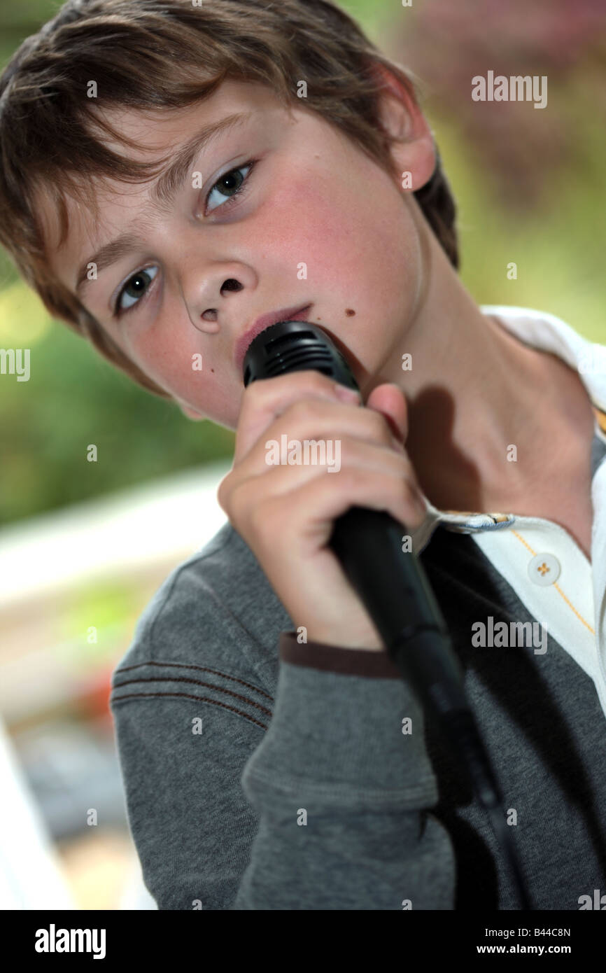 Young Boy Singing Model Released Stock Photo - Alamy