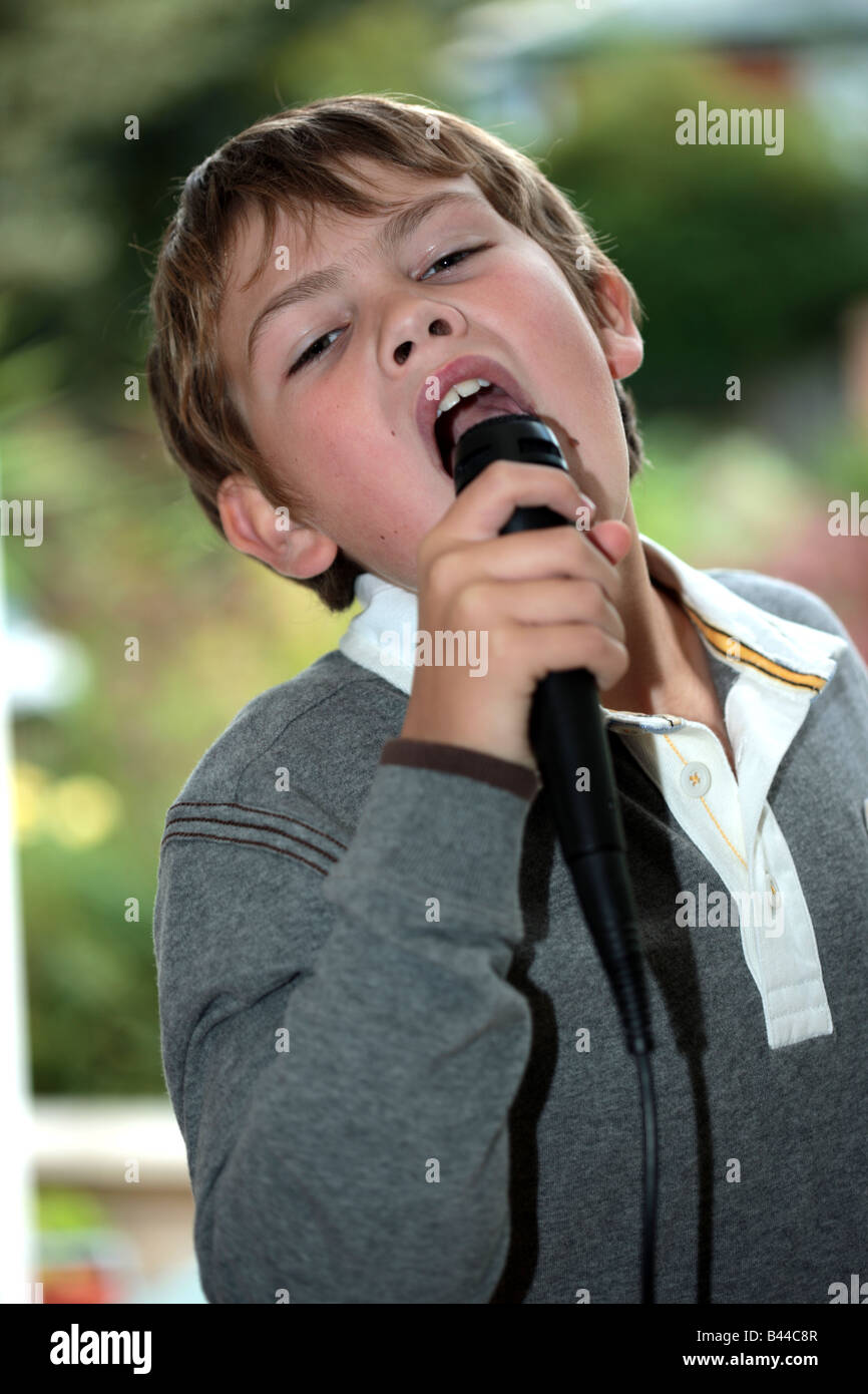 Young Boy Singing Model Released Stock Photo - Alamy