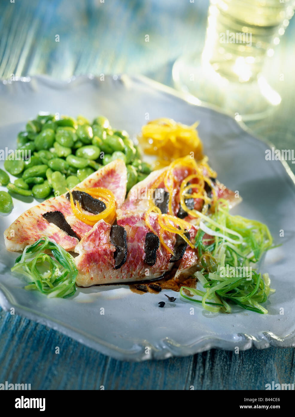 Red mullet fillets with truffle flakes Stock Photo - Alamy