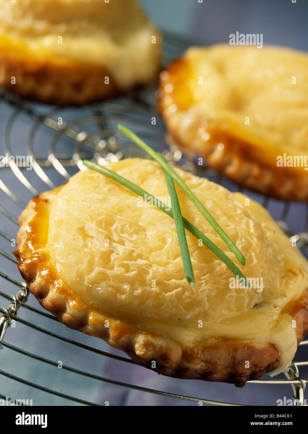 Puff-pastry cheese tartlets Stock Photo - Alamy