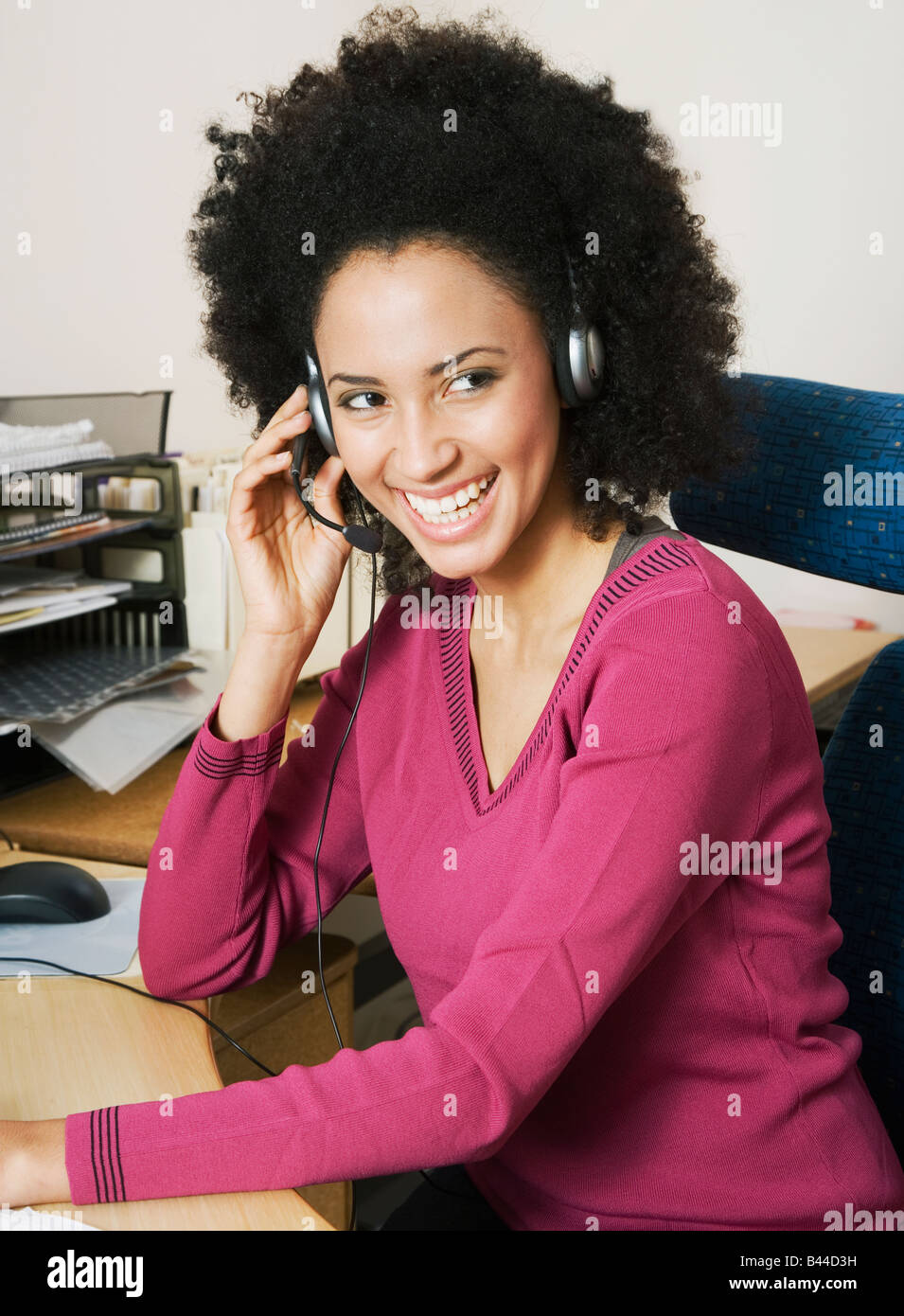 Receptionist at desk headset hi-res stock photography and images - Alamy