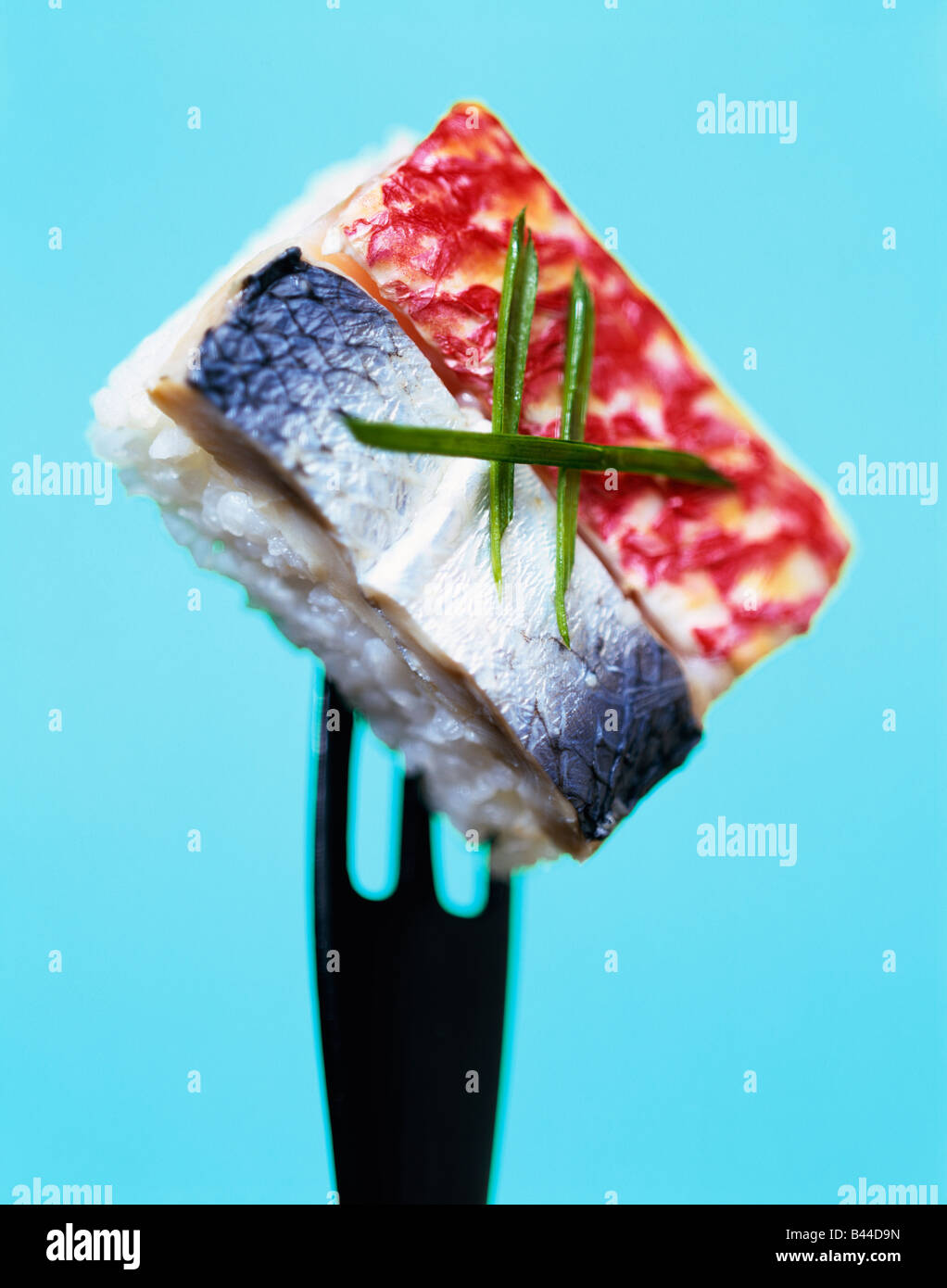 Sushi on a fork Cut Out Stock Images & Pictures - Alamy