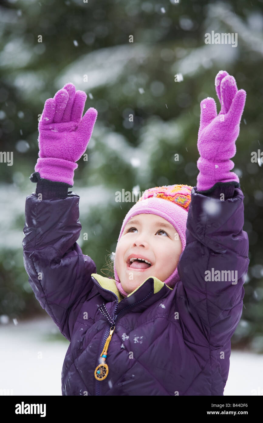 Asian girl playing in the snow hi-res stock photography and images - Alamy