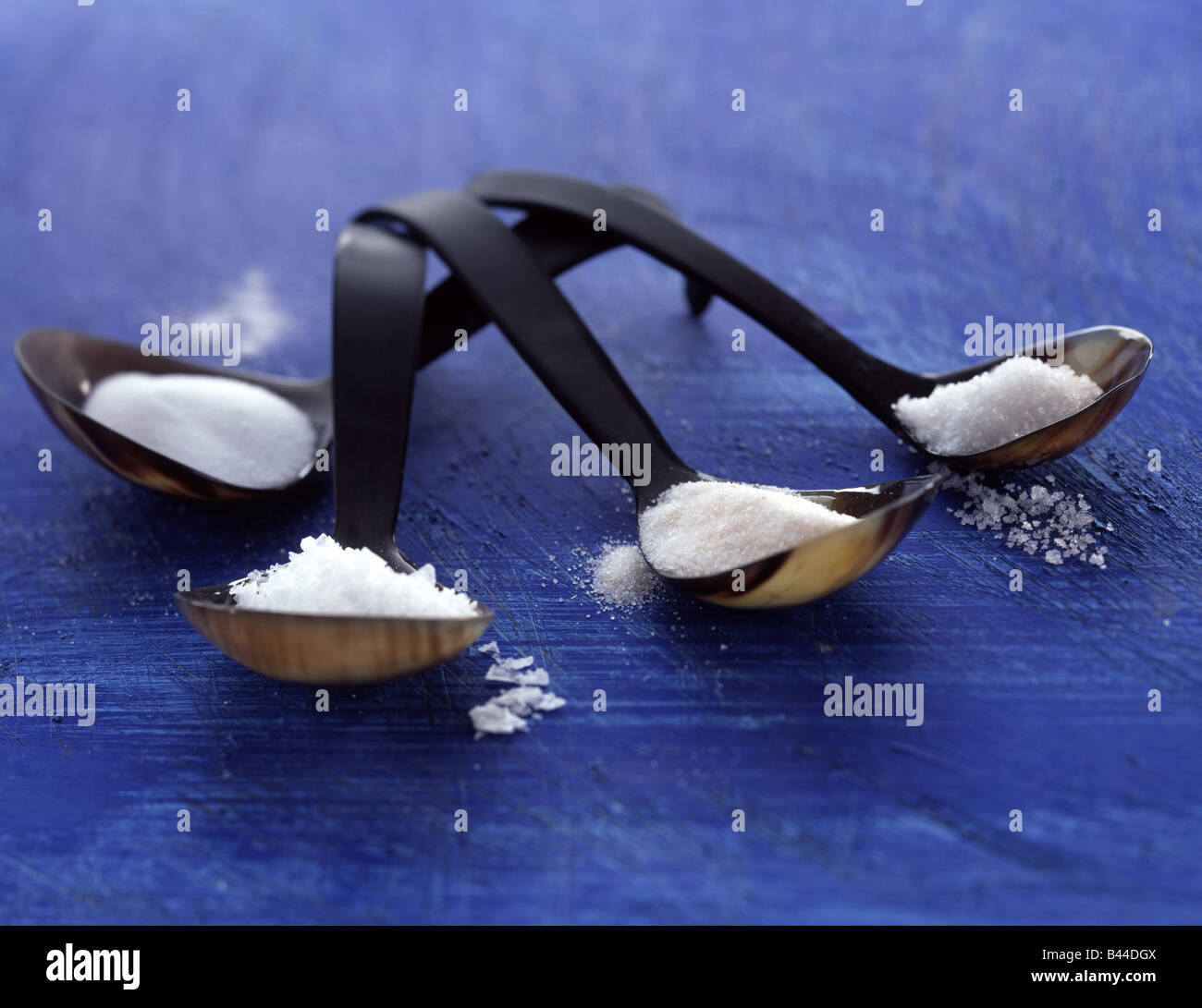 Salt in spoons Stock Photo - Alamy