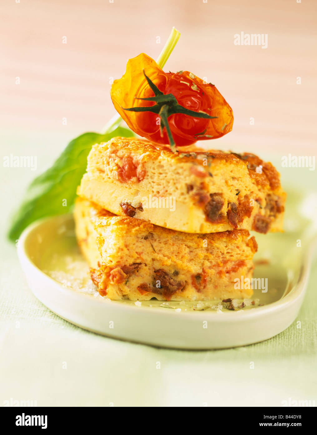 Three tomato baked flan Stock Photo - Alamy